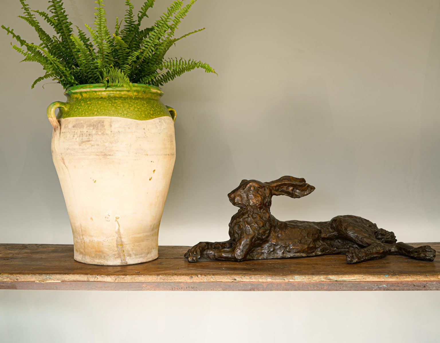 Bronze Recumbent Hare Sculpture - DGA by Tina Bird