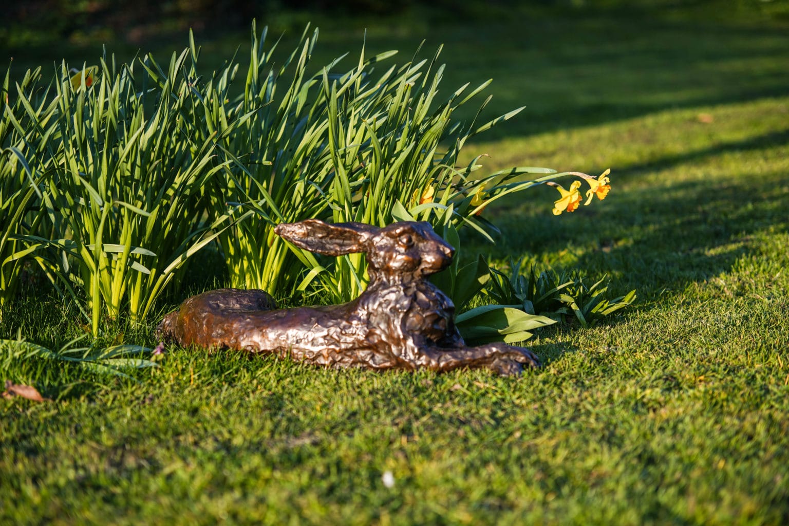 Bronze Recumbent Hare Sculpture - DGA by Tina Bird