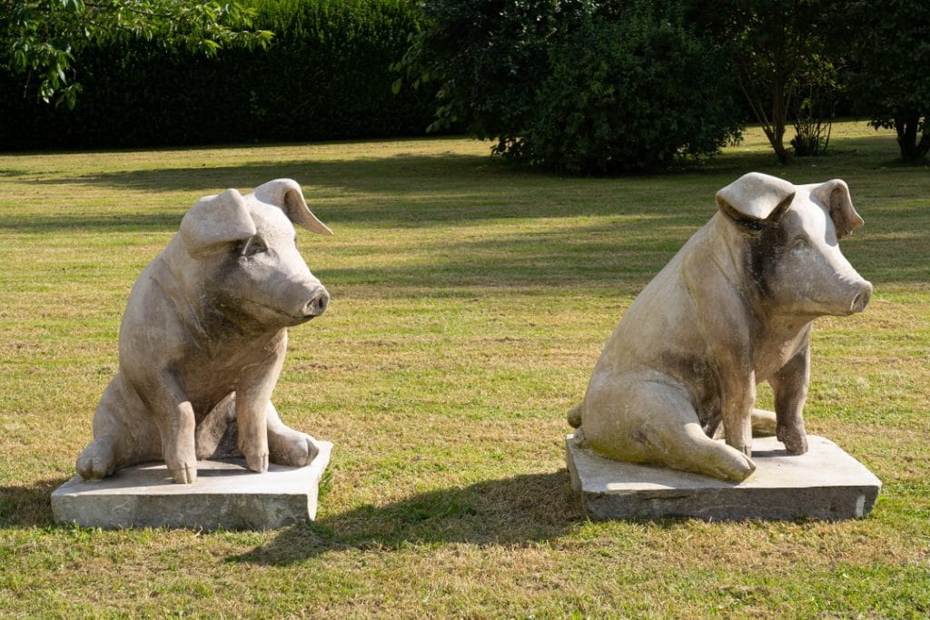 Two Portland Stone Life Size Garden Pig Statues - DGA by Tina Bird