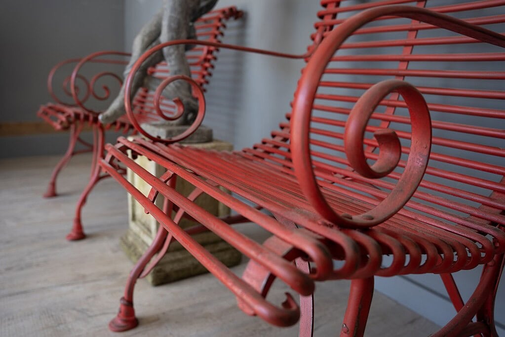 A pair of red, original Arras Garden Armchairs - DGA by Tina Bird