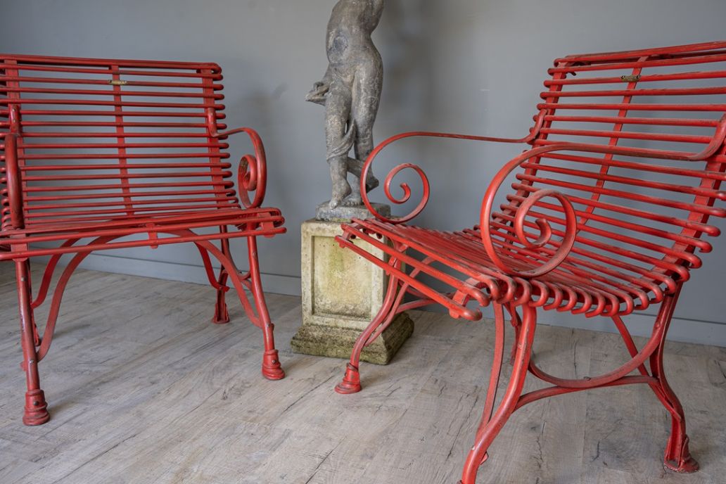 A pair of red, original Arras Garden Armchairs - DGA by Tina Bird