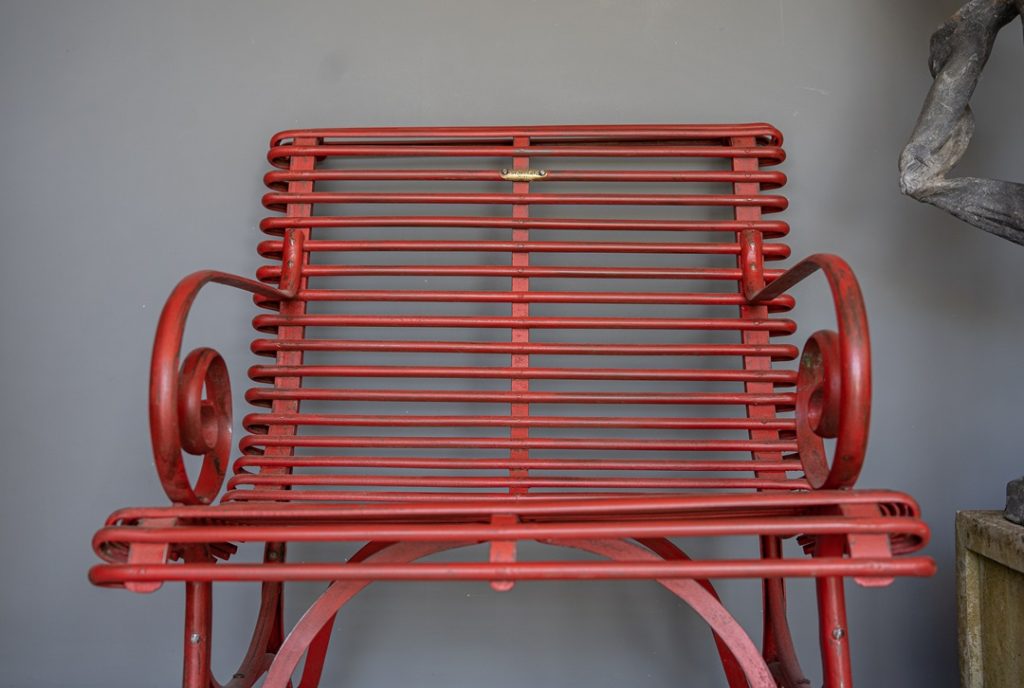 A pair of red, original Arras Garden Armchairs - DGA by Tina Bird