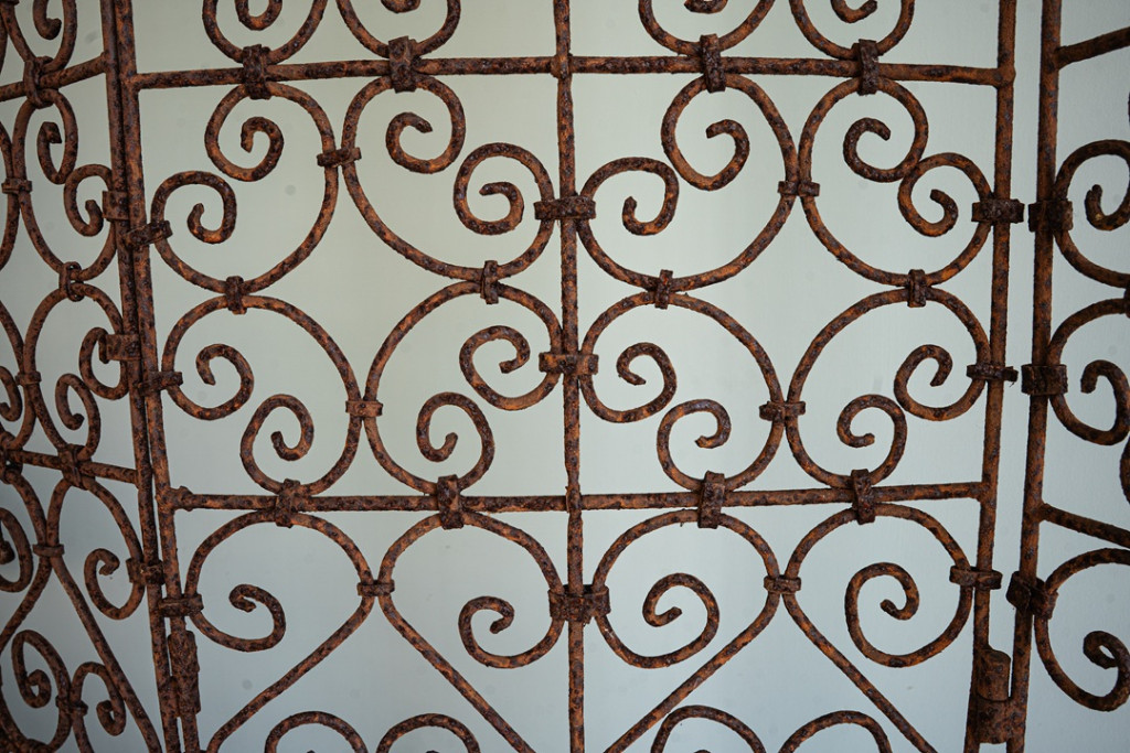 An antique wrought iron three-fold garden screen - DGA by Tina Bird
